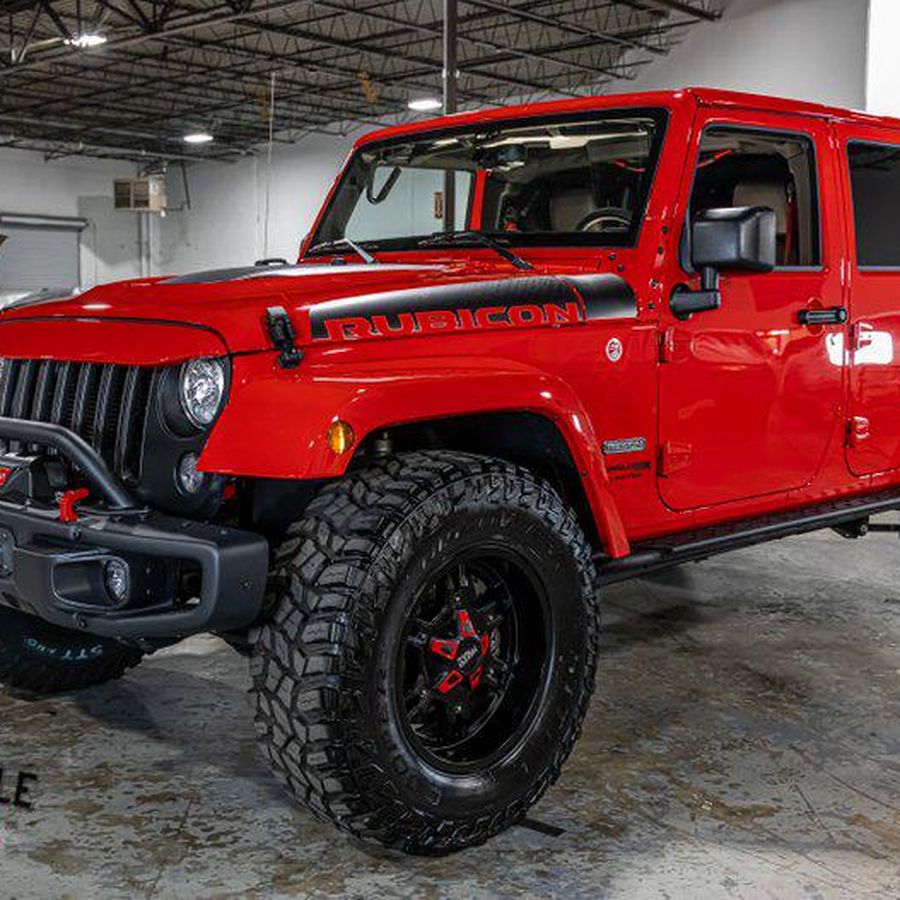 Red Jeep Wrangler Unlimited Lifted