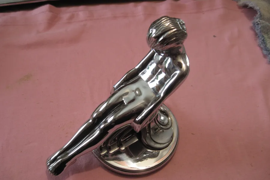 Packard radiator cap 1930 Adonis sliding boy - Hemmings